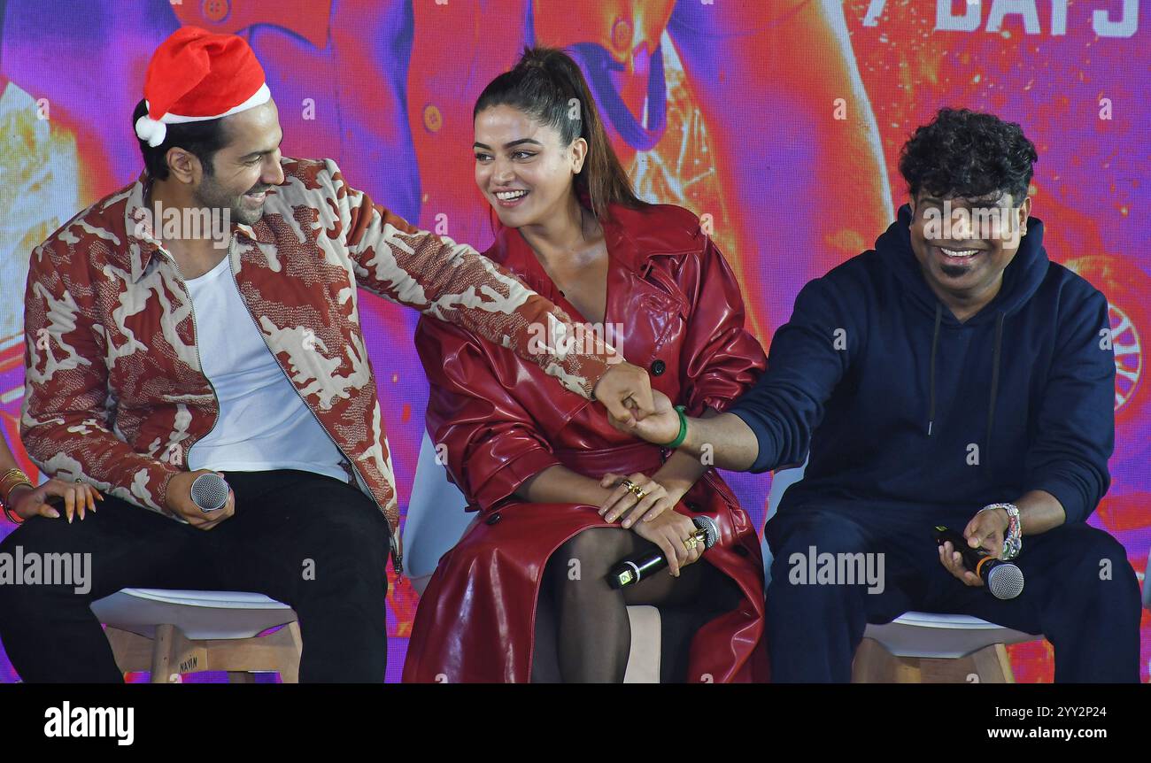 L-R Bollywood actor Varun Dhawan, Indian film actress Wamiqa Gabbi (c ...