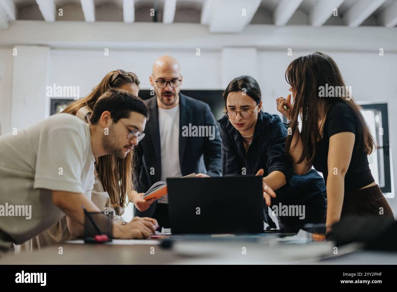 Instructor students collaborating on learning hi-res stock photography ...