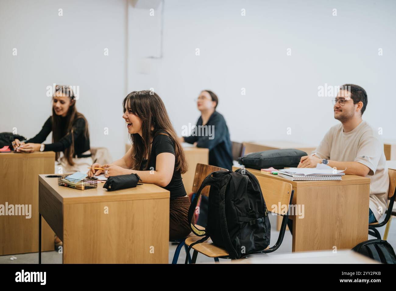 Engaged high school students attending interactive classroom session ...