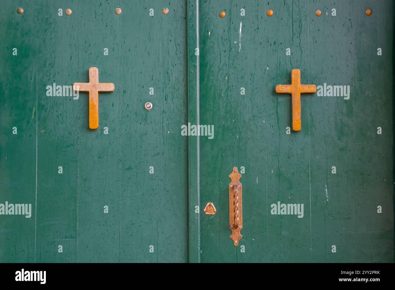 Green door of the monastery with Orthodox crosses Stock Photo - Alamy