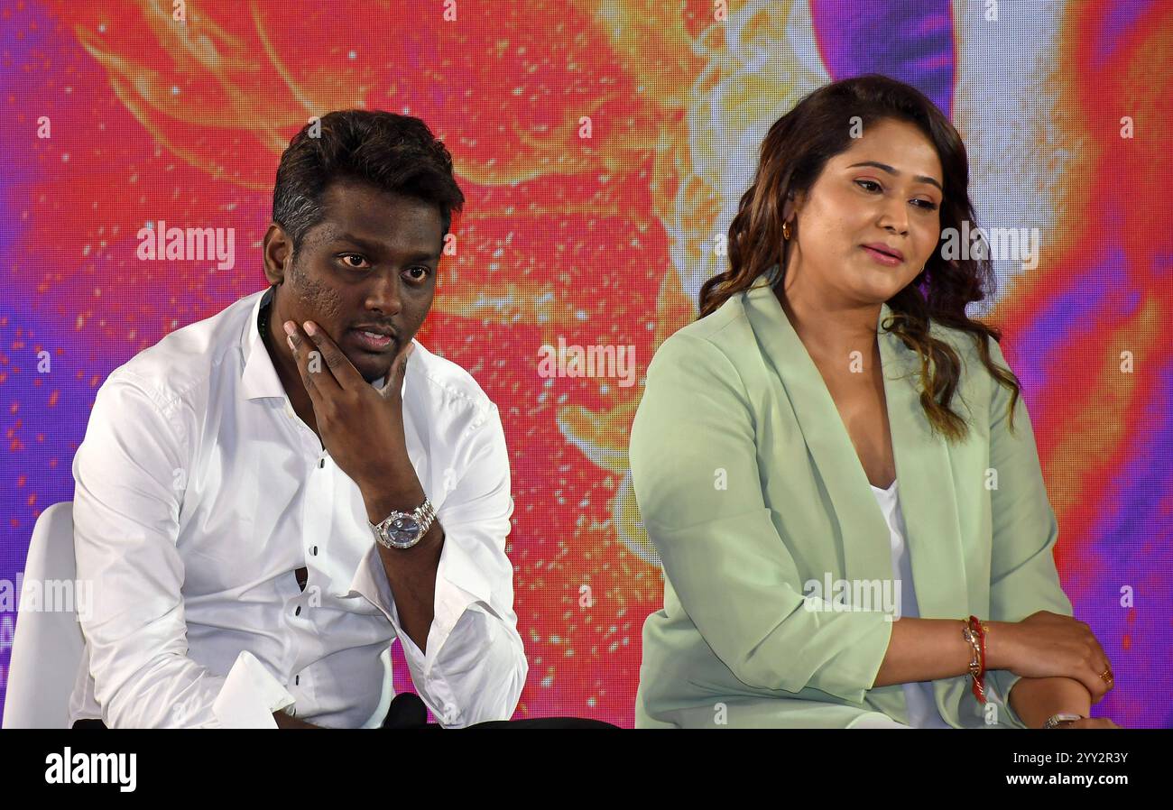 Mumbai, India. 18th Dec, 2024. L-R Producers Atlee Kumar and his wife ...