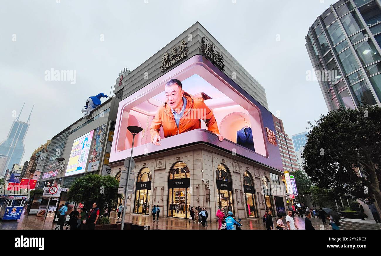The newly opened Youngor Clothing Mall is seen on Nanjing Road ...