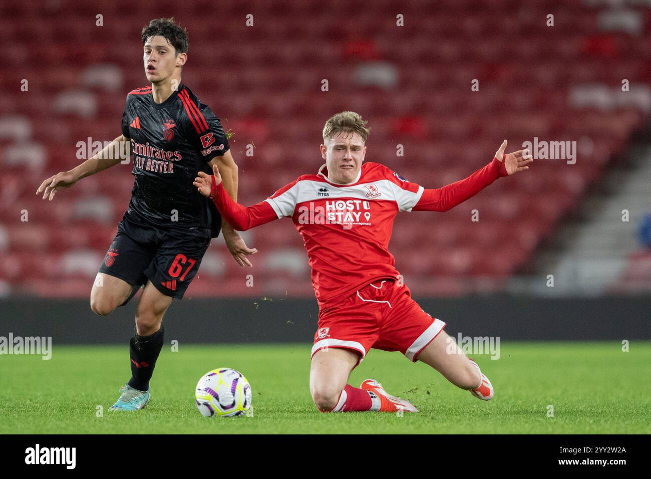 Middlesbrough's Charlie Lennon is brought down by S.L. Benfica's ...