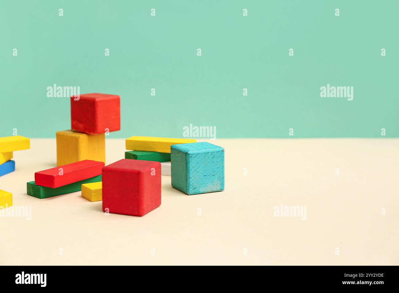 Different colorful building cubes and blocks on color background Stock ...