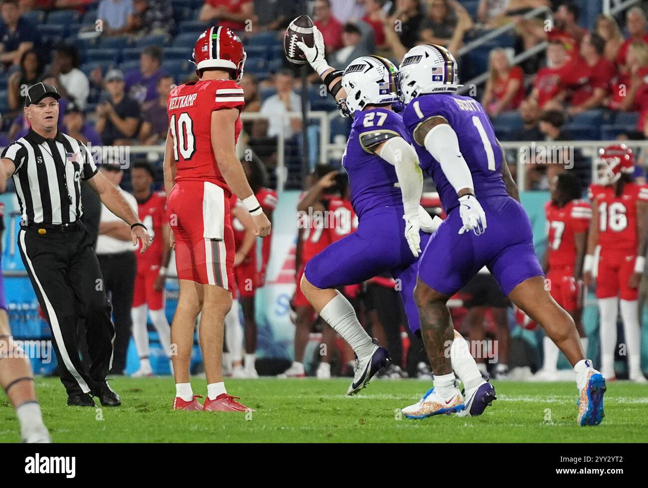 James Madison linebacker Jacob Dobbs (27) runs with the ball after ...