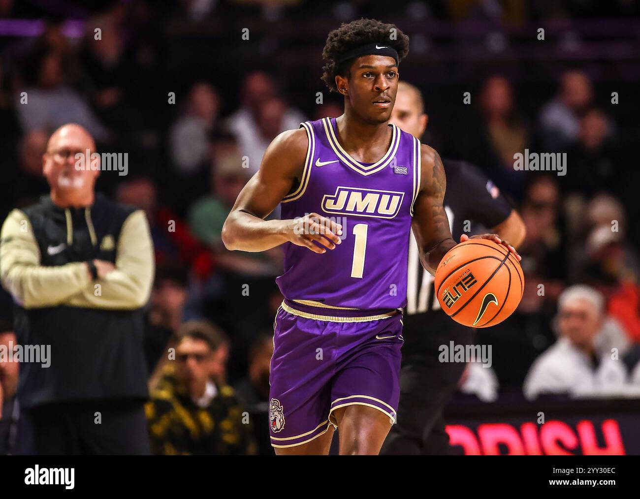 December 17, 2024: James Madison guard Xavier Brown (1) dribbles ball ...