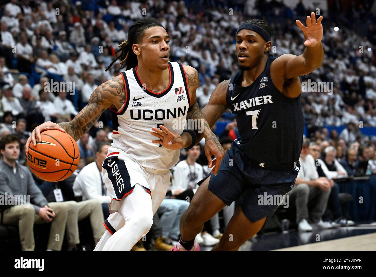 UConn guard Solo Ball (1) dribbles the ball as Xavier guard Ryan ...