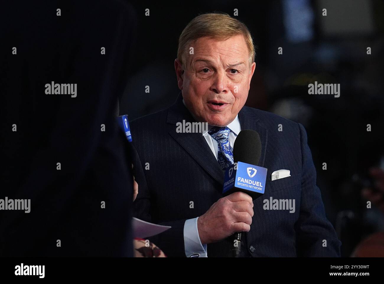 Television announcer Mike Fratello in the first half of an NBA ...