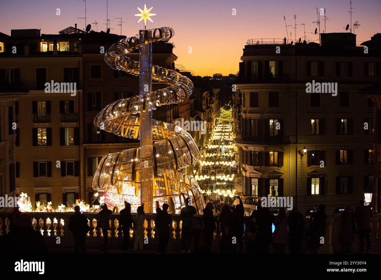 Rome, Italy. 17th Dec, 2024. People visit Spanish Steps decorated with ...