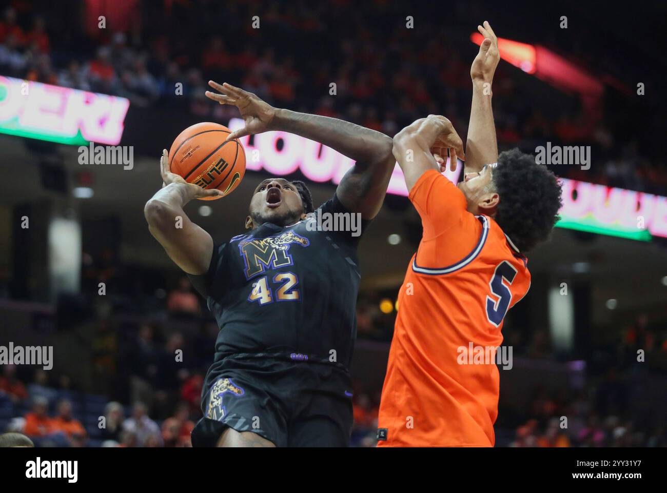Memphis' Dain Dainja (42) goes for a layup while Virginia's Jacob Cofie ...