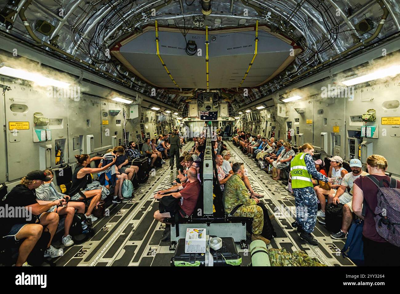 This photo released by Australian Department of Defence, shows Australian citizens on board a ...