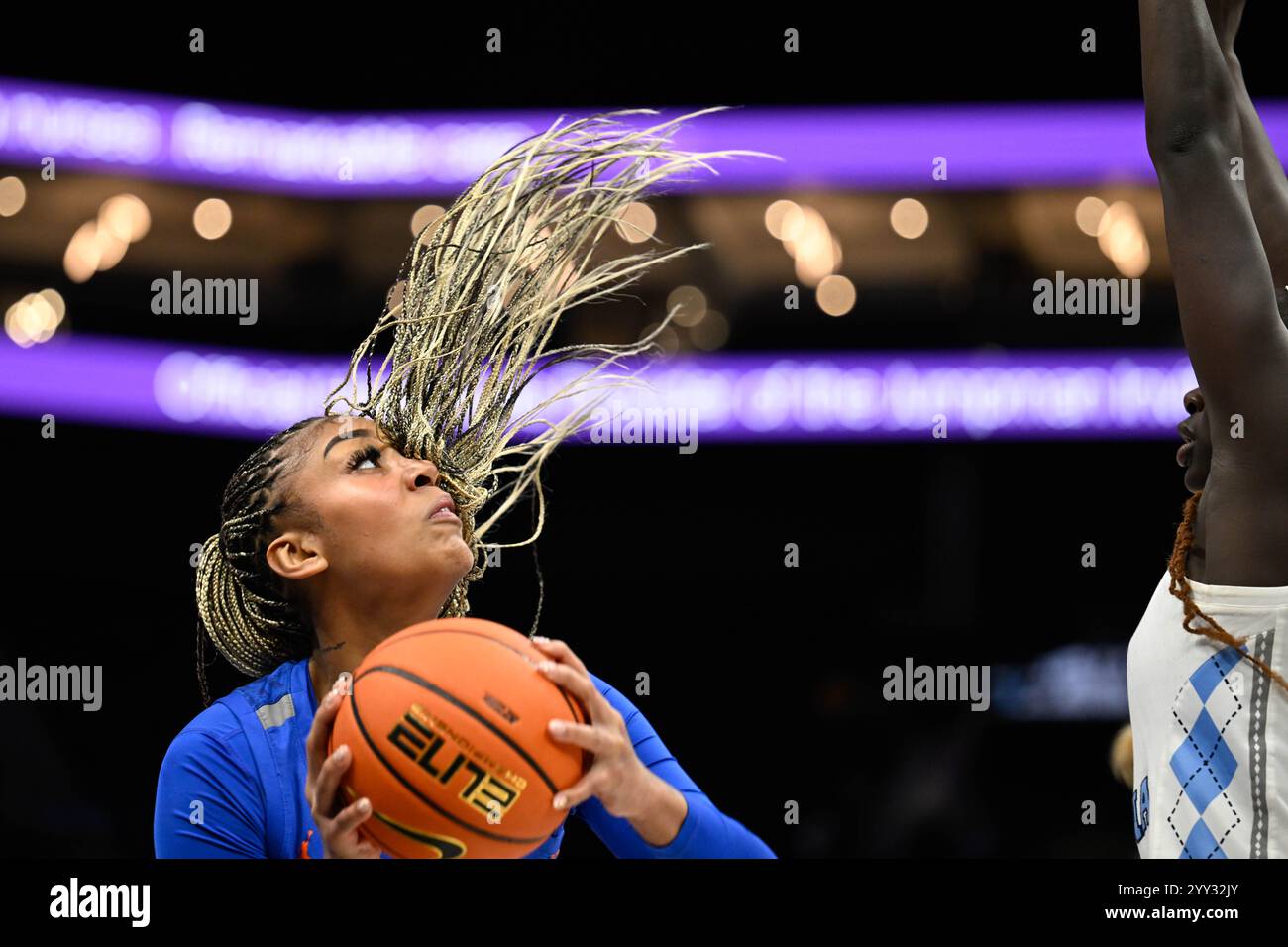 Charlotte, North Carolina, USA. 18th Dec, 2024. Florida Gators center ...