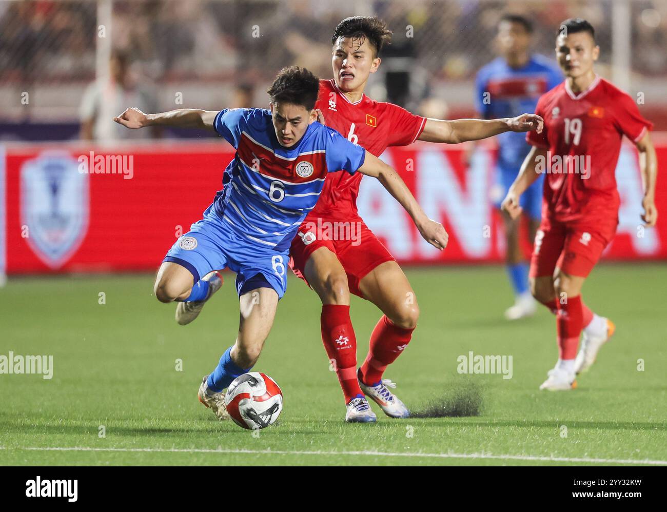 Manila, Philippines. 18th Dec, 2024. Sandro Miguel Sison Reyes (L) of the Philippines vies with ...