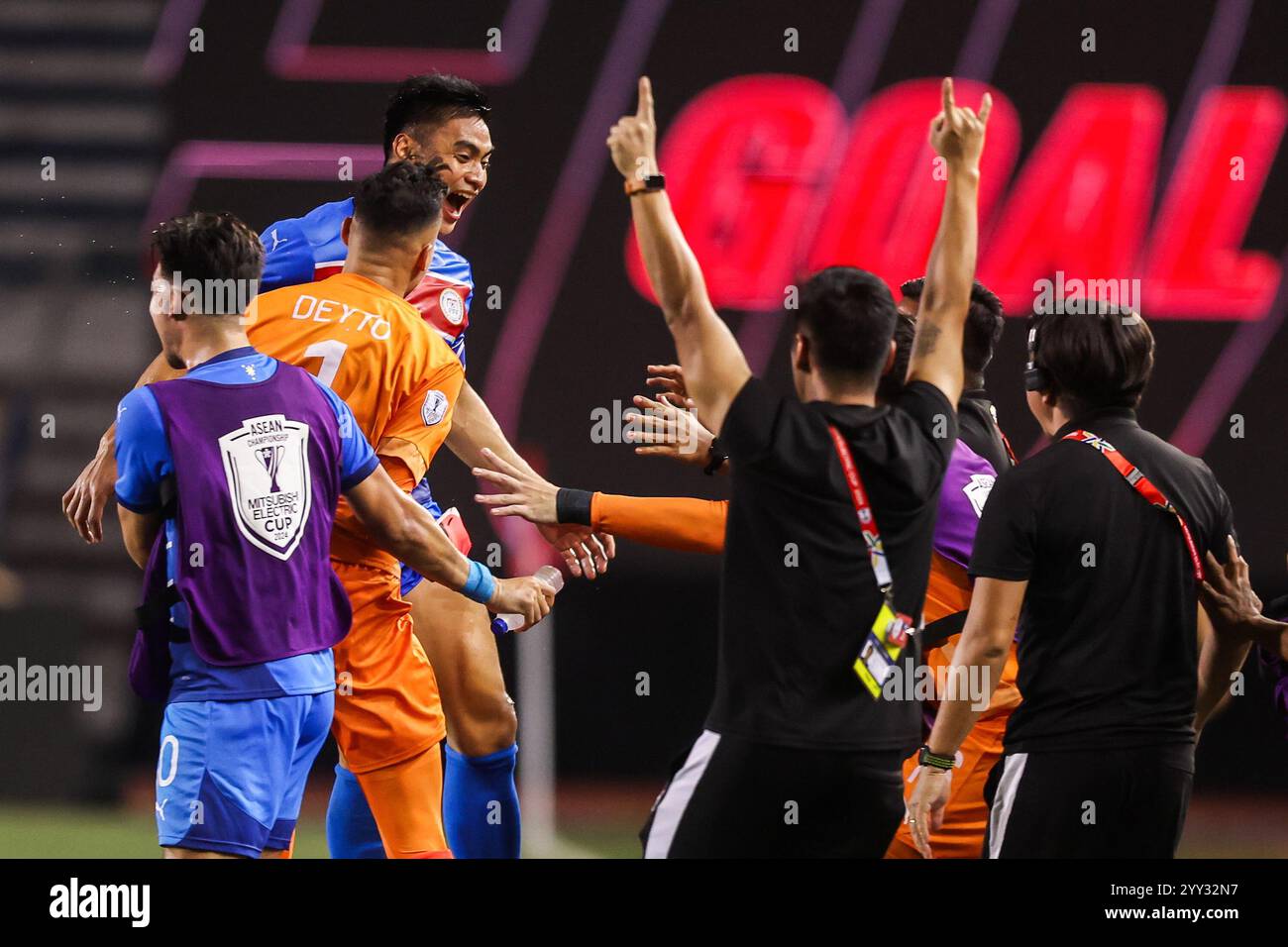 Manila, Philippines. 18th Dec, 2024. Players of the Philippines celebrate after scoring a goal ...