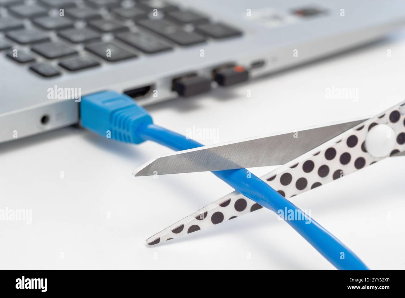 Computer internet cable cutting concept Stock Photo - Alamy