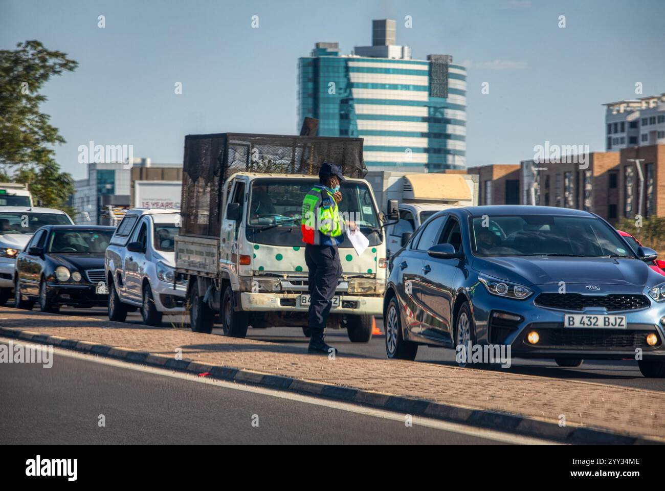 Gaborone, Botswana,13 May 2020, police officer checking drivers at rush ...