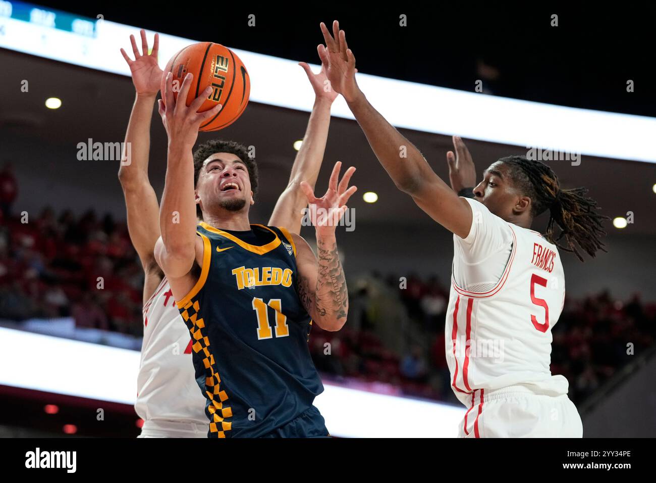 Toledo guard Sam Lewis (11) shoots against Houston forward Ja'Vier ...