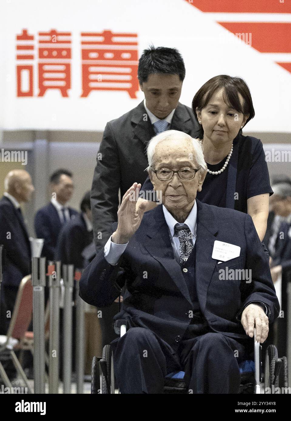 The file photo shows The Yomiuri Shimbun Holdings Editor-in-Chief Tsuneo Watanabe reacts after ...