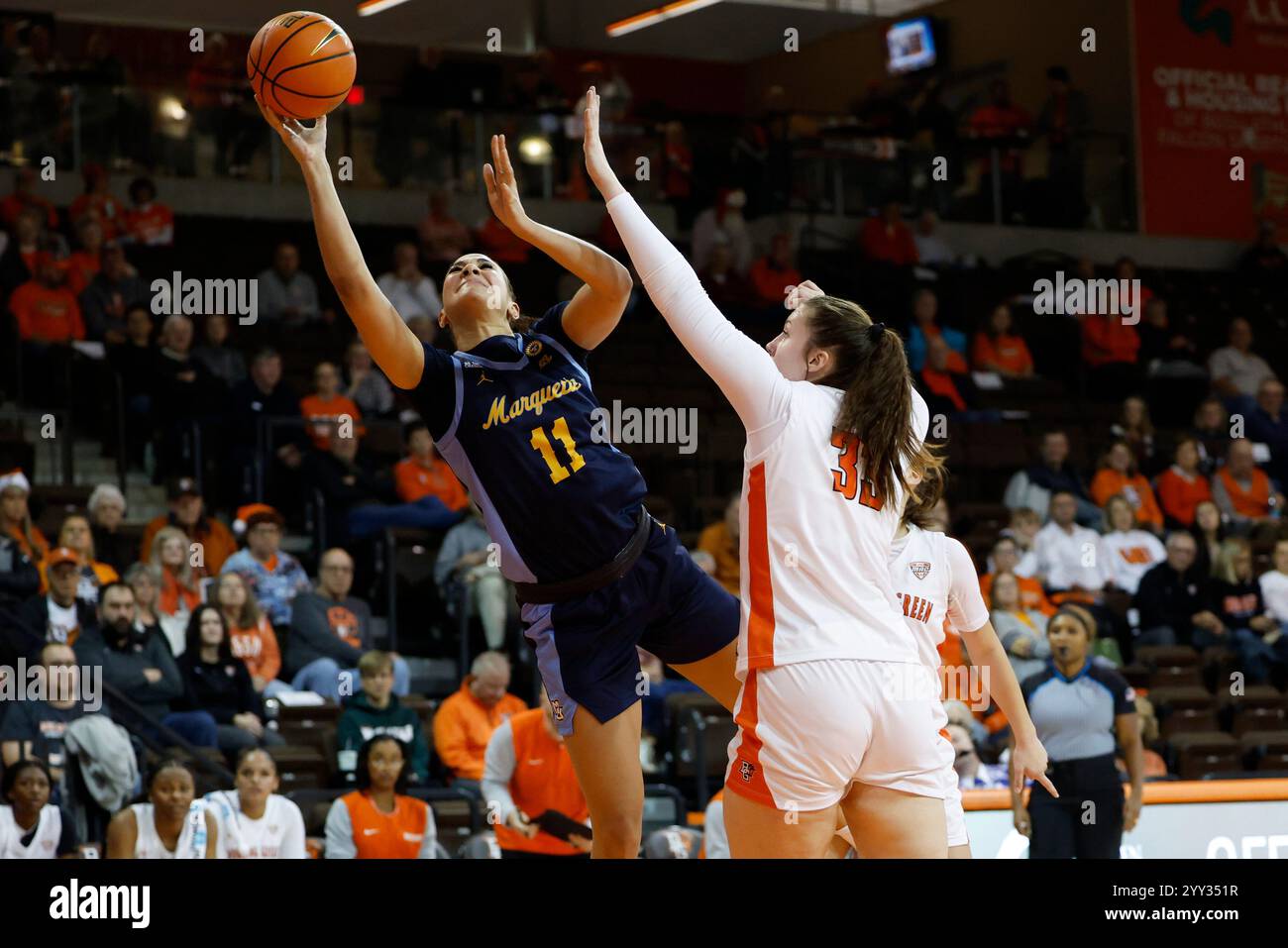 Marquette forward Skylar Forbes (11) shoots on Bowling Green forward ...