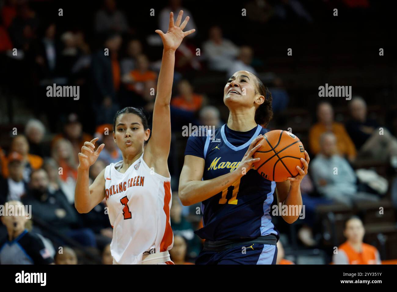 Marquette forward Skylar Forbes (11) is defended by Bowling Green guard ...