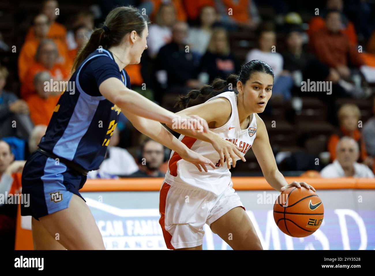 Bowling Green guard Amy Velasco (1) dribbles defended by Marquette ...