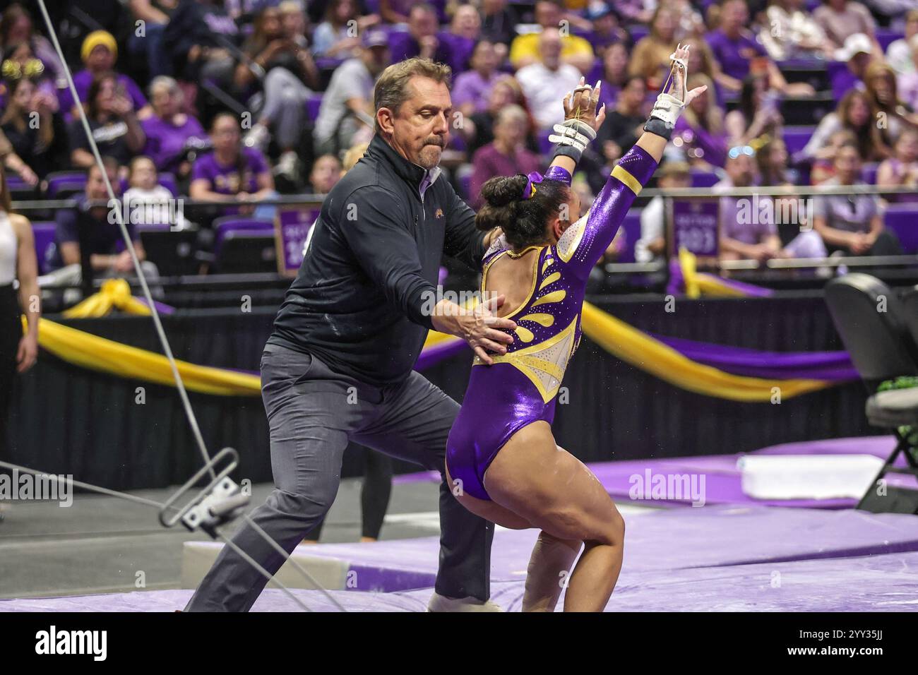 Baton Rouge, LA, USA. 16th Dec, 2024. LSU Head Coach Jay Clark spots ...