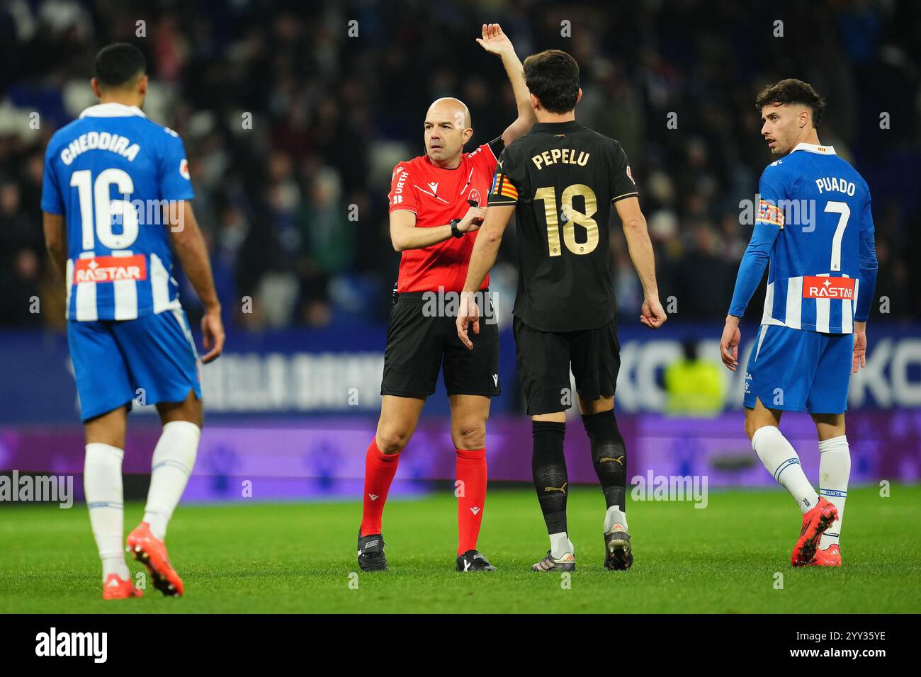 Jose Luis Garcia Pepelu of Valencia CF, Javi Puado of RCD Espanyol and ...