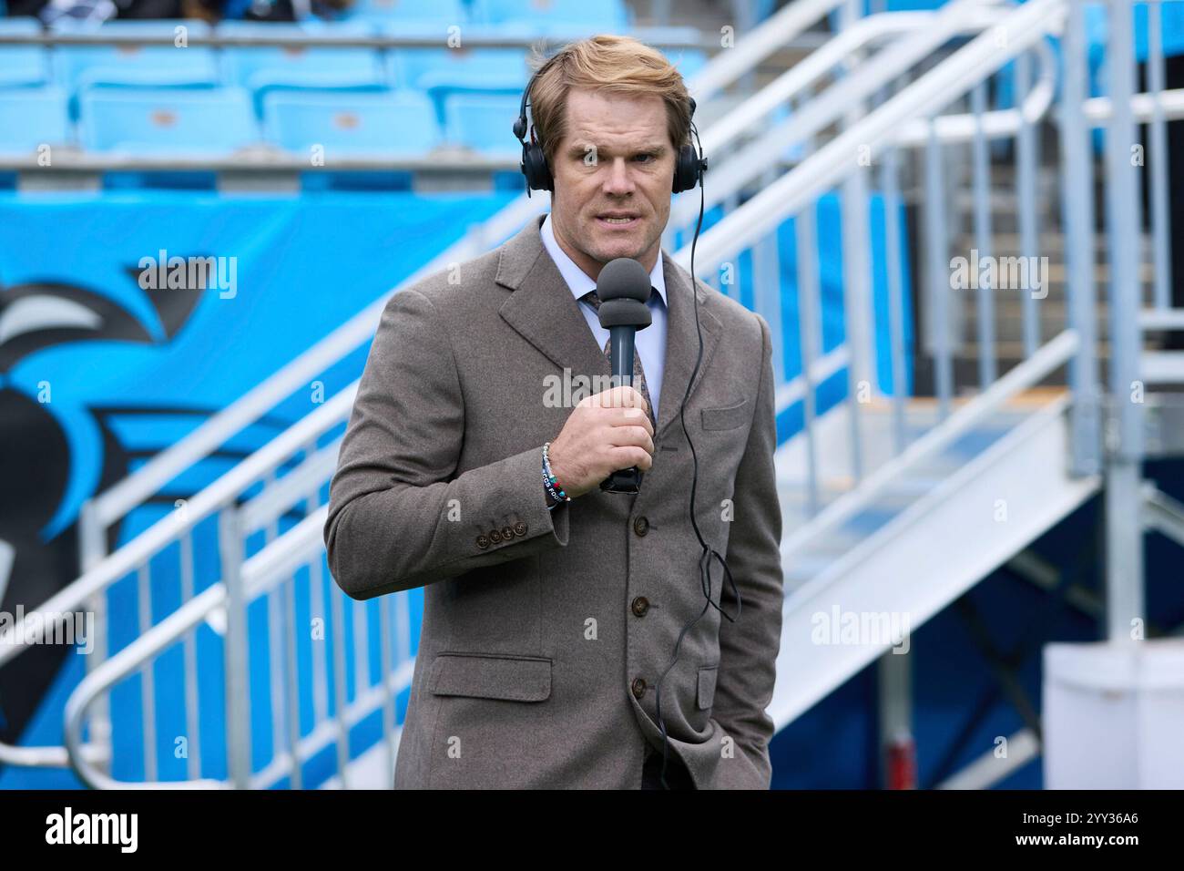 FOX NFL color commentator Greg Olsen works on the sideline prior to an ...