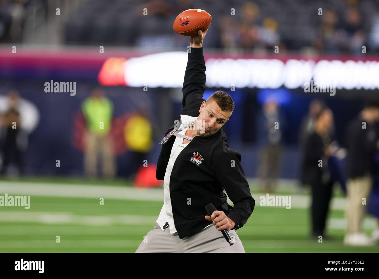 Former NFL tight end Rob Gronkowski spikes the ball before the LA Bowl ...