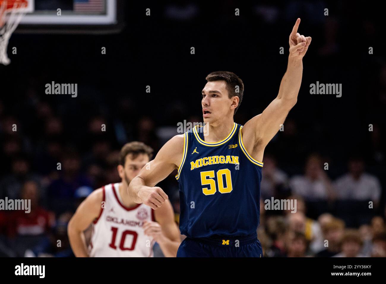 Charlotte, NC, USA. 18th Dec, 2024. Michigan Wolverines center ...