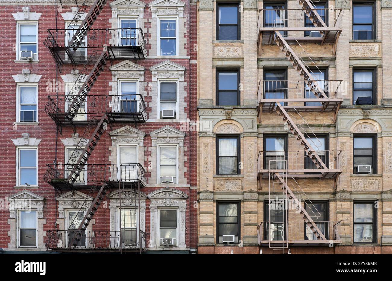 New York City, old apartment building with external fire ladder and ...