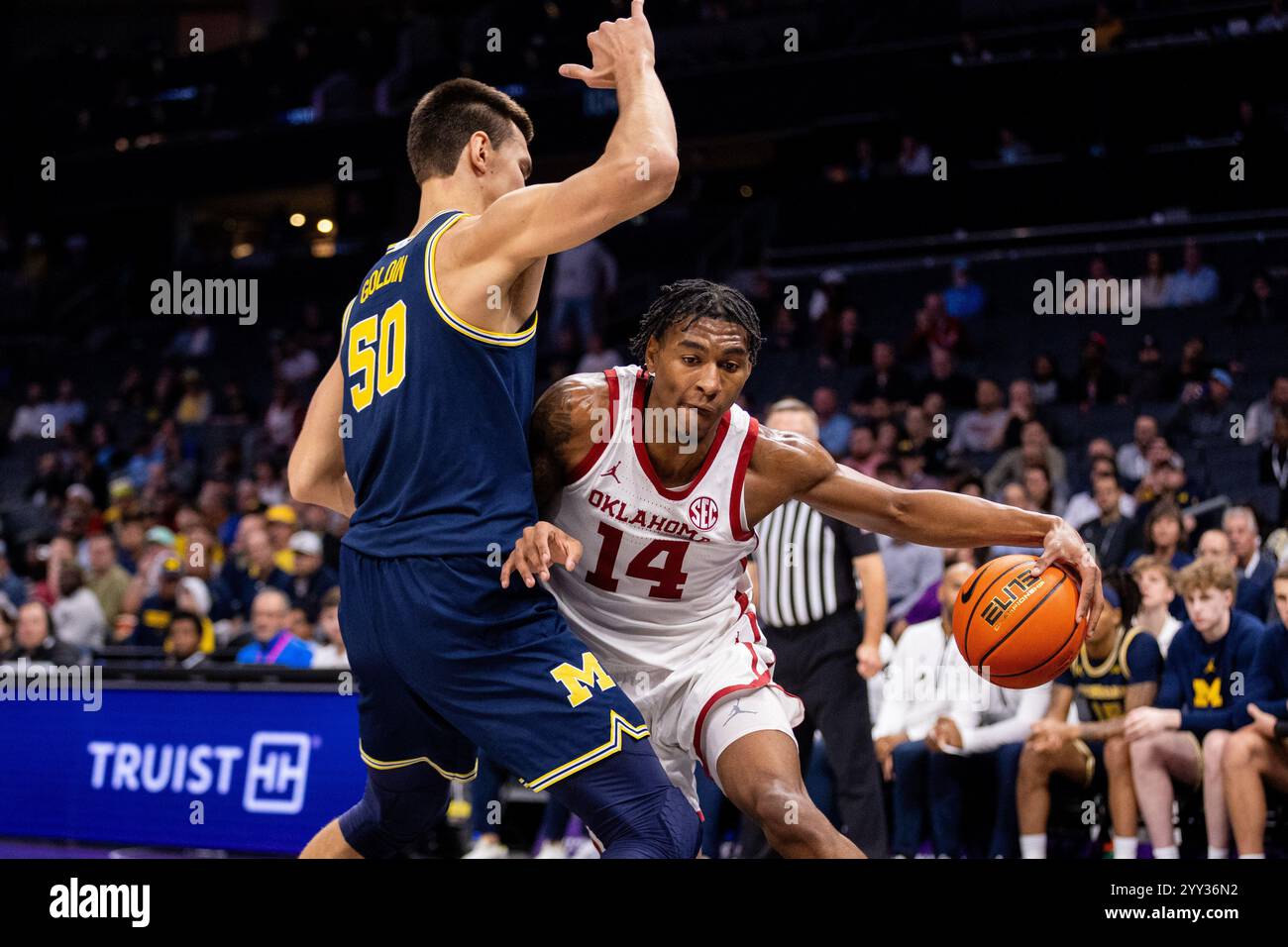 December 18, 2024: Oklahoma Sooners forward Jalon Moore (14) drives on ...