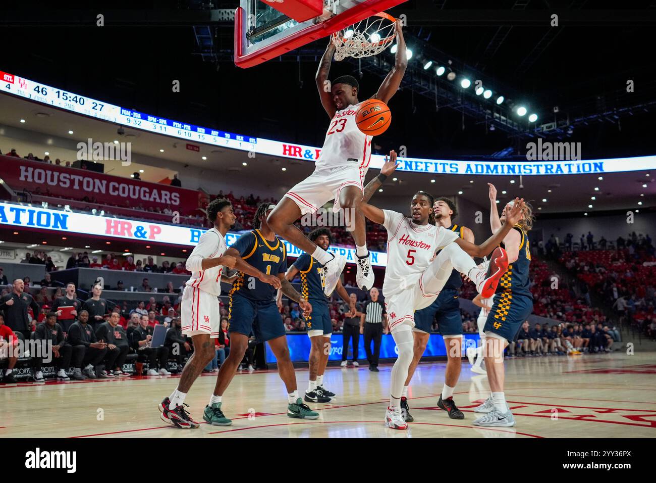 Houston guard Terrance Arceneaux (23) dunks during the second half of ...