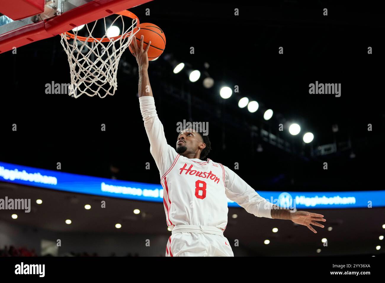 Houston guard Mylik Wilson (8) shoots during the second half of an NCAA ...