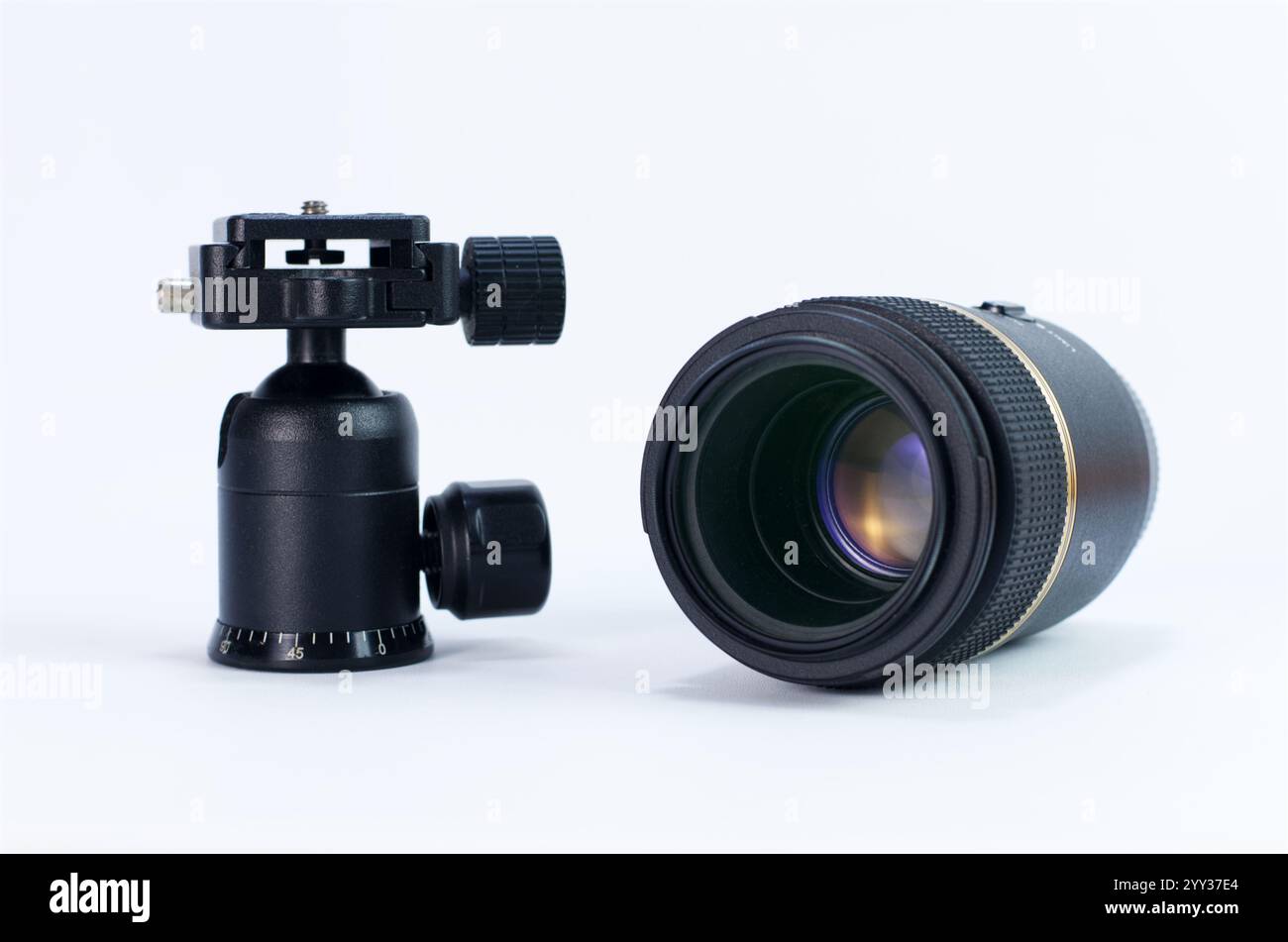 Professional Camera Lens and Tripod Ball Head on White Background Stock ...