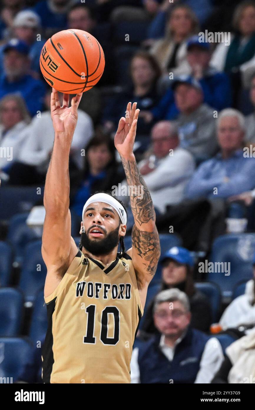 DECEMBER 18, 2024: Wofford Terriers guard Corey Tripp (10) takes a ...