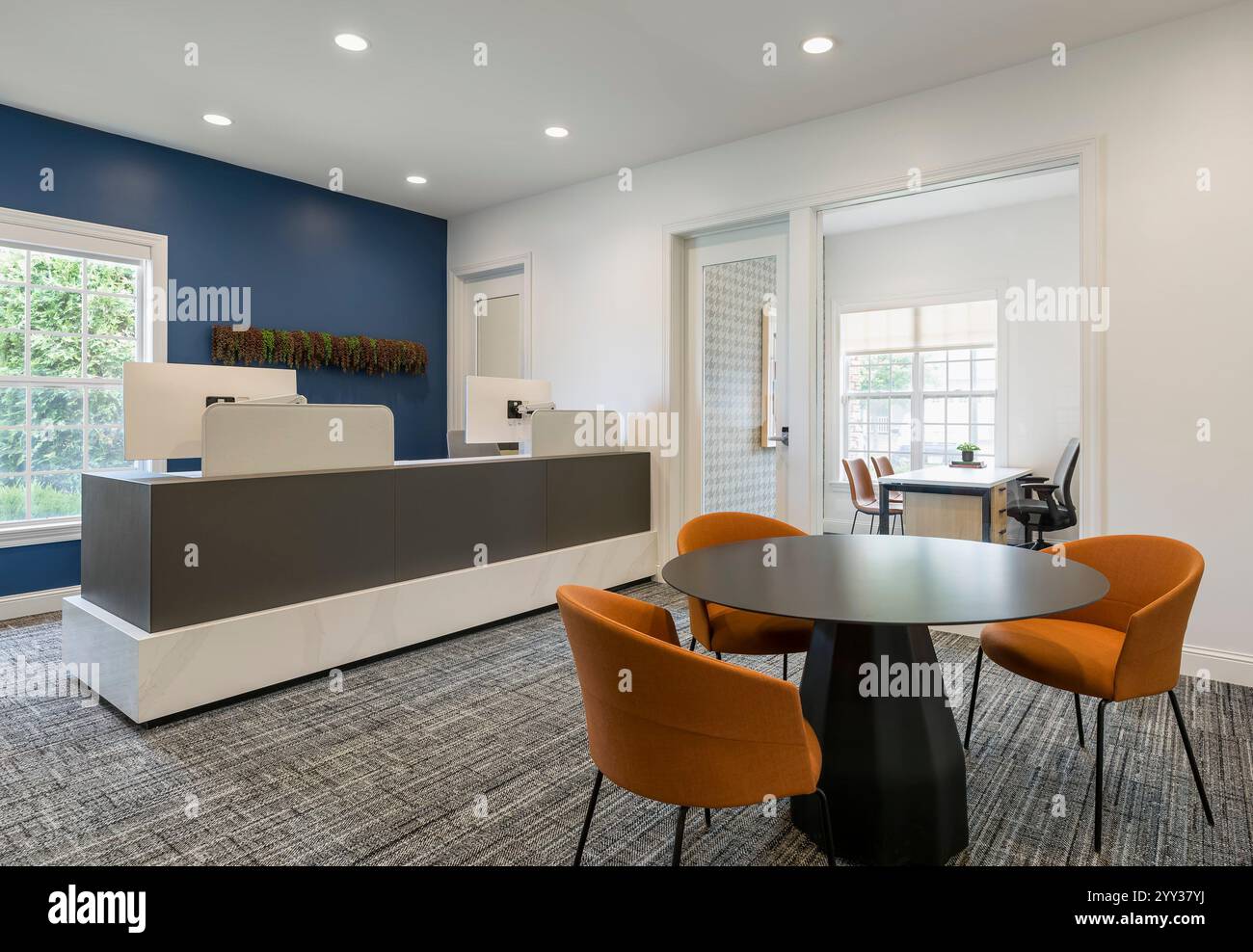 Front office of apartment building with view into private office ...