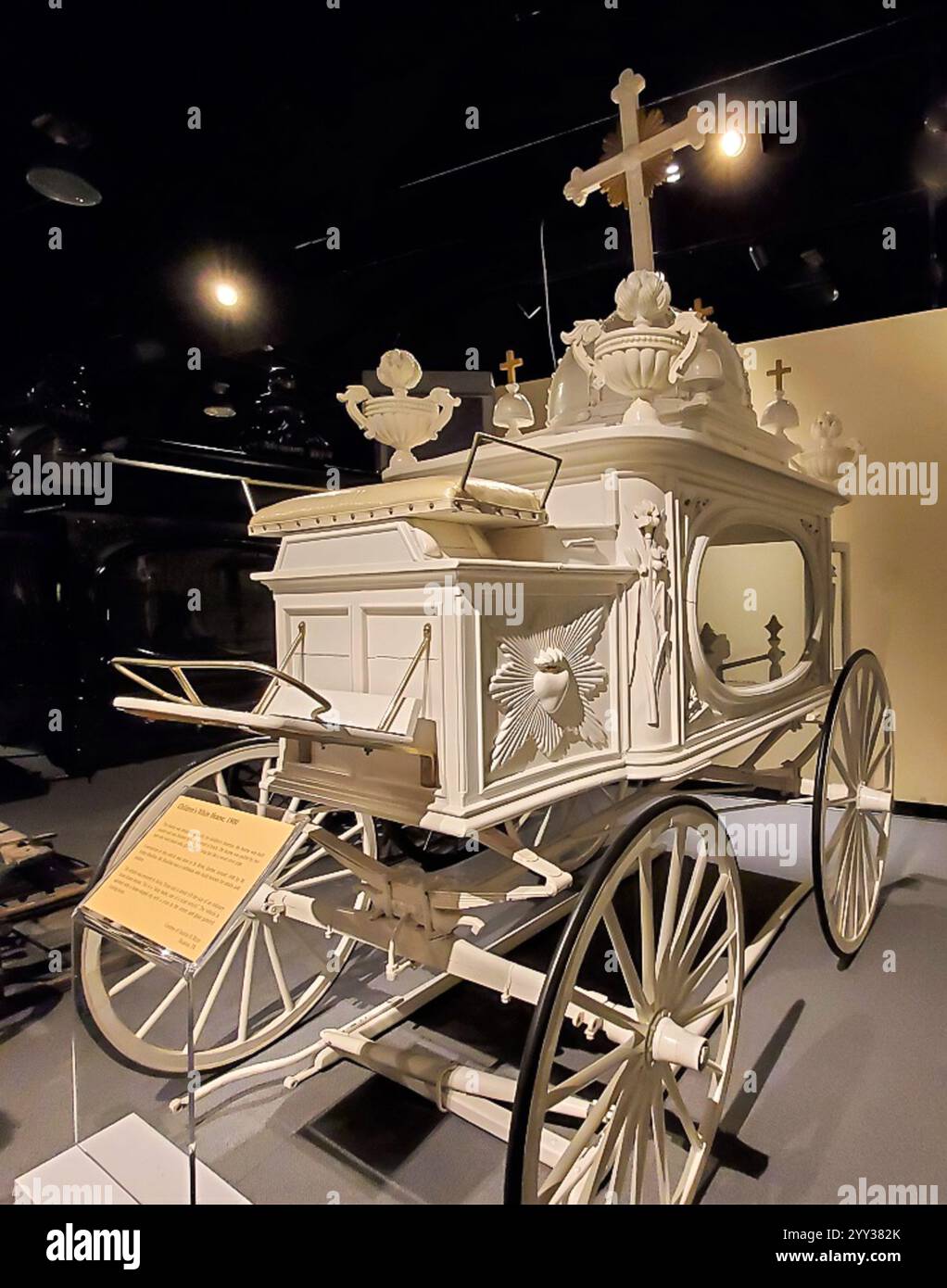 Antique, white horse-drawn child's hearse with finely carved cross ...