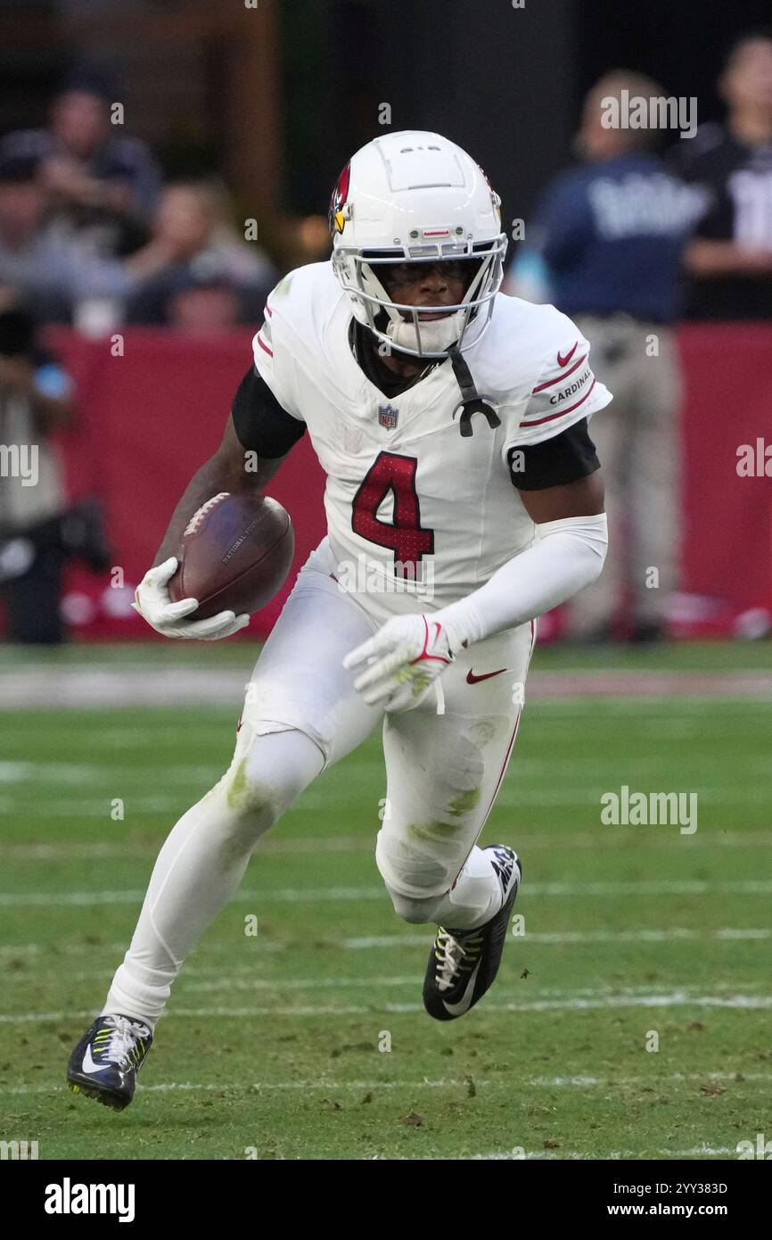 Arizona Cardinals wide receiver Greg Dortch (4) runs the ball against ...