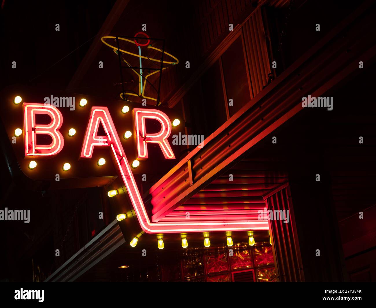 The Murray Bar's vintage neon sign with pink lettering and a stylized ...