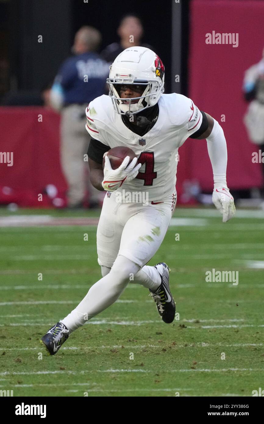 Arizona Cardinals wide receiver Greg Dortch (4) runs the ball against ...