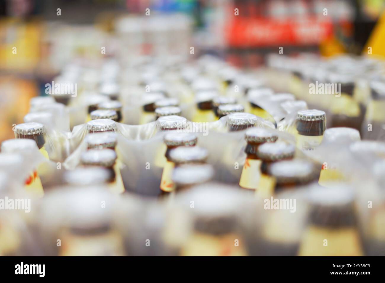 Bottles of beverages in a supermarket display Stock Photo - Alamy