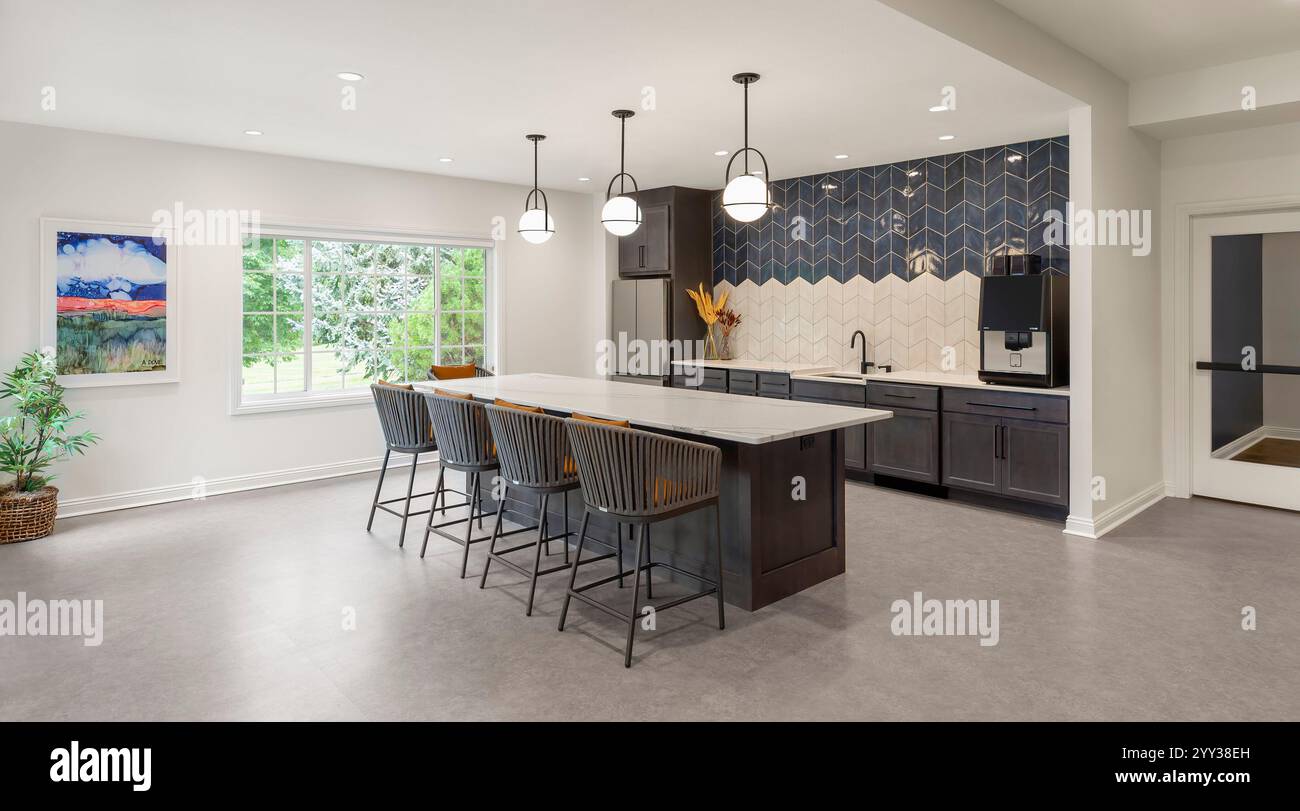 Kitchen with full amenities in public area of apartment complex Stock ...