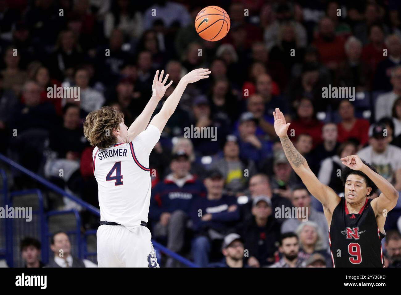 Gonzaga guard Dusty Stromer (4) shoots while pressured by Nicholls ...