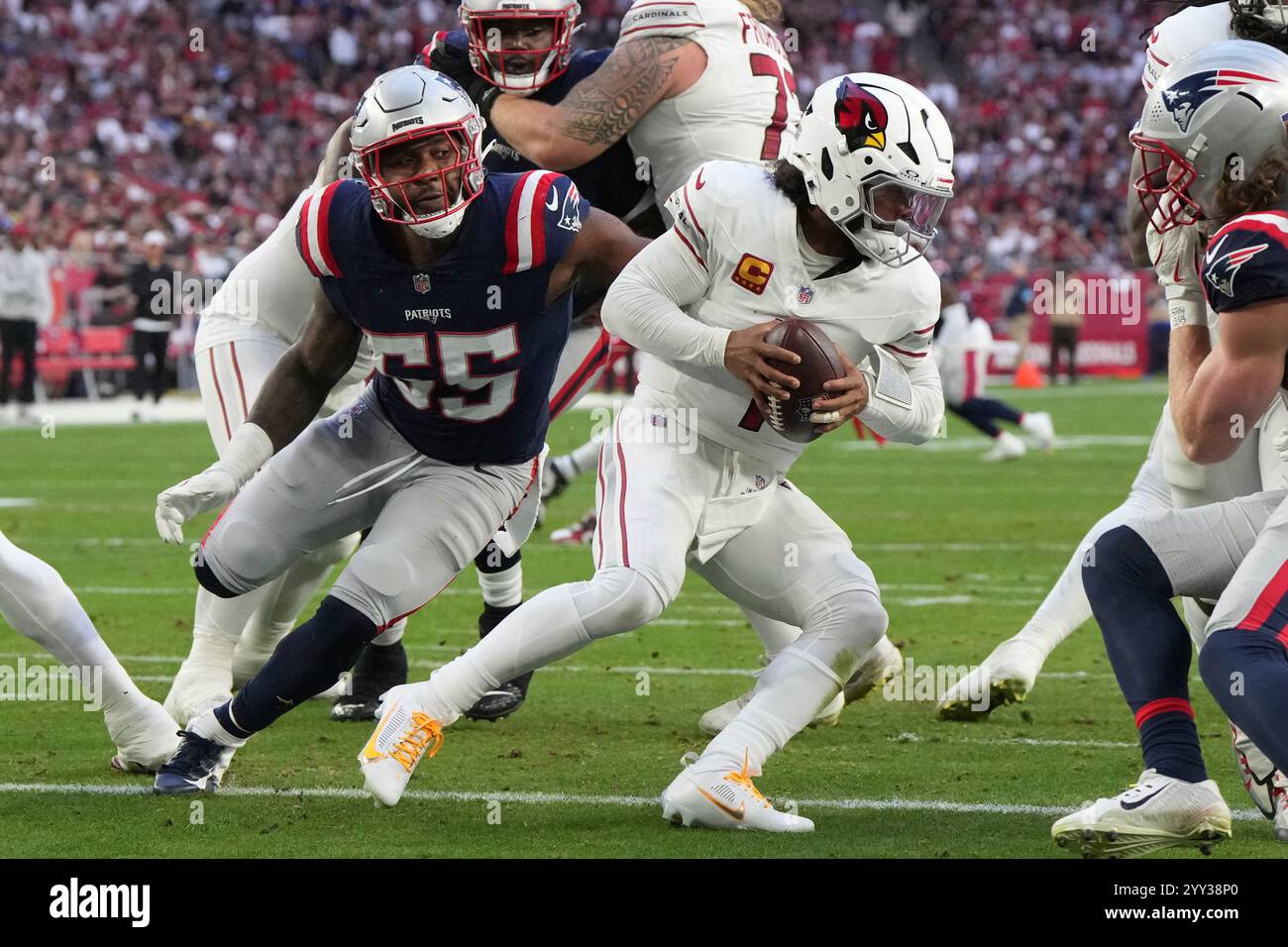 New England Patriots linebacker Yannick Ngakoue (55) pressures Arizona ...