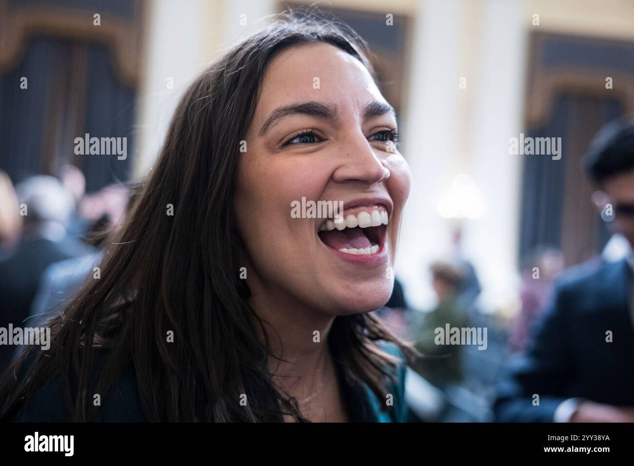 Rep. Alexandria Ocasio-Cortez (D-N.Y.) speaks with guests after a ...