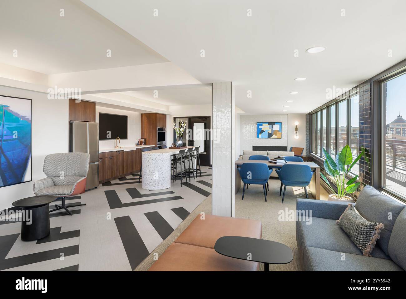 A community room on the top floor of an apartment building with a ...