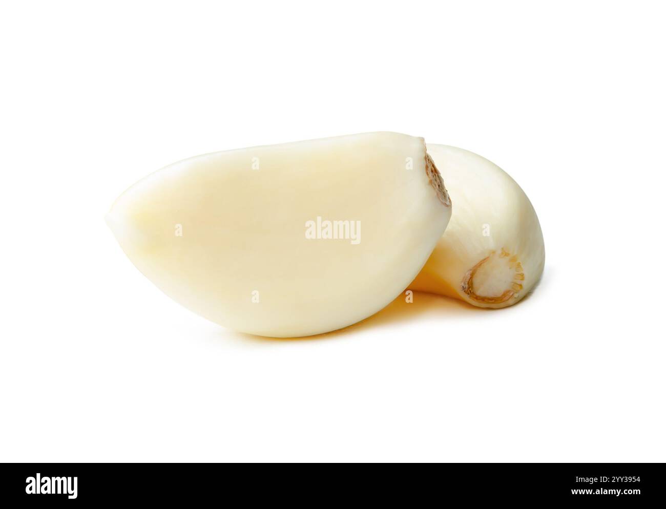 Side view of peeled garlic cloves in stack is isolated on white ...