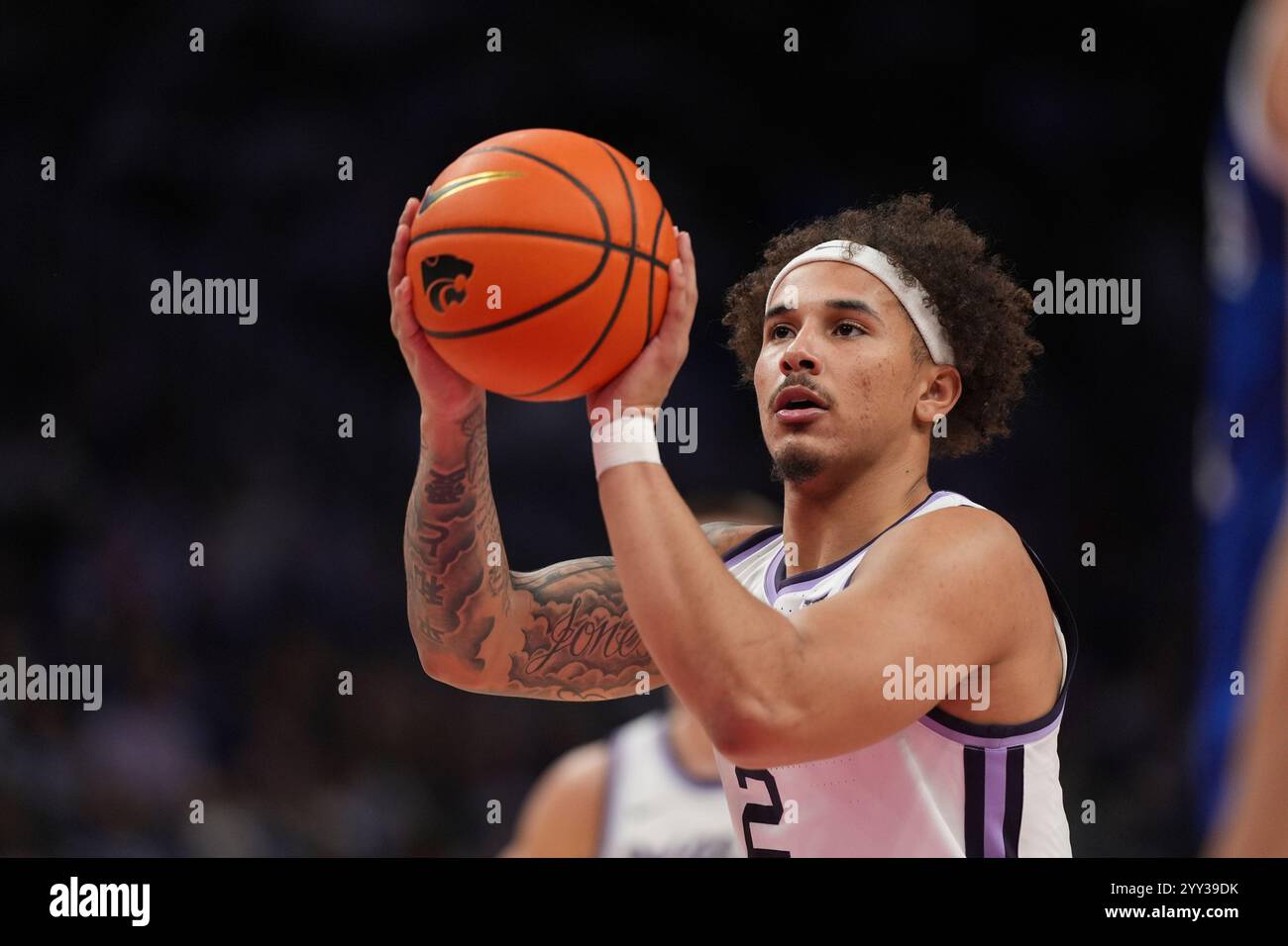 Kansas State guard Max Jones shoots during the first half of an NCAA ...