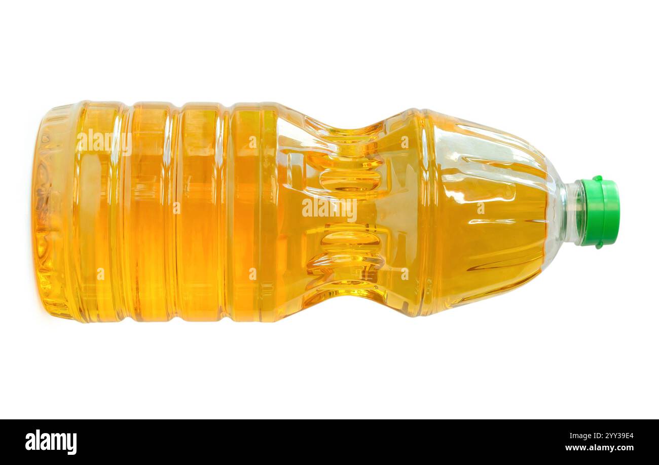 Yellow cooking vegetable oil in medium plastic bottle is isolated on ...